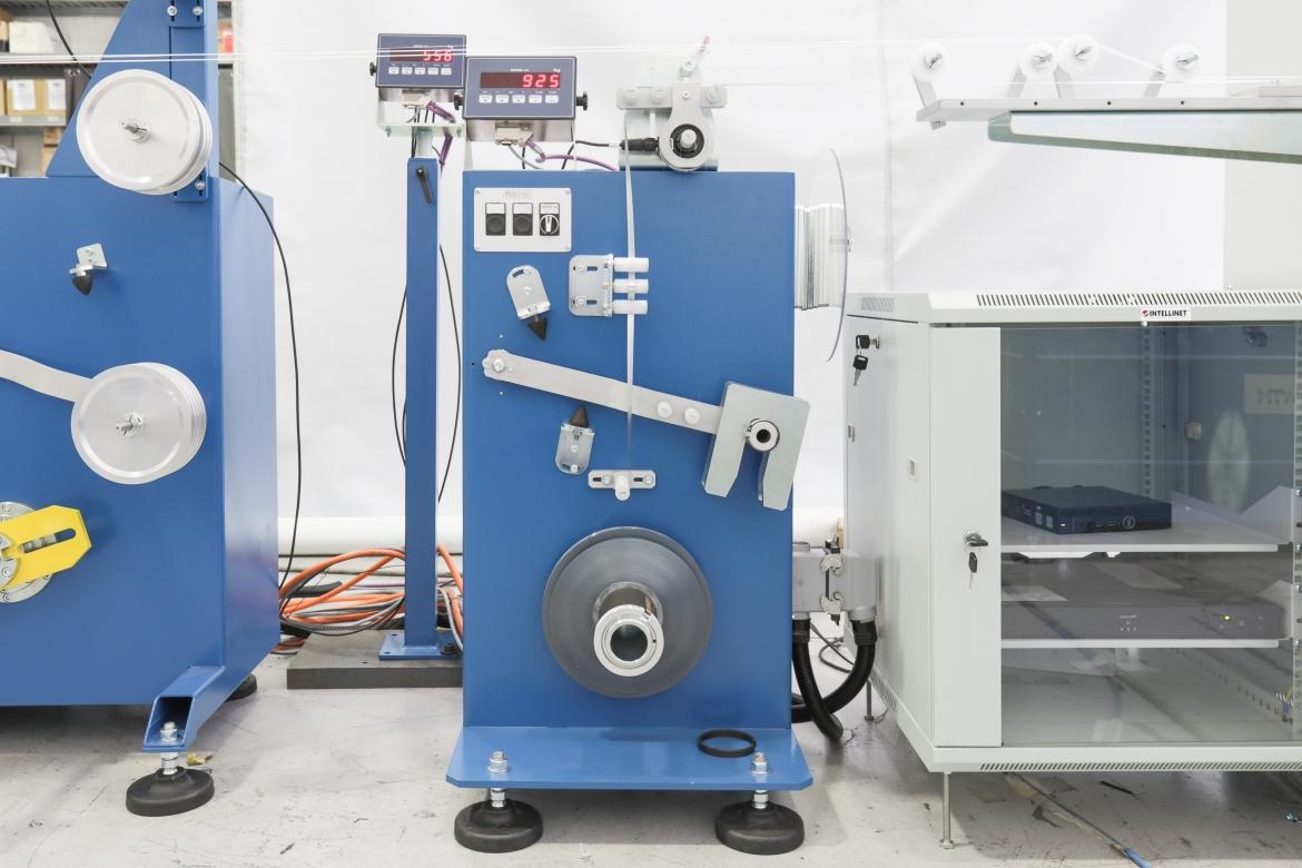 Longitudinal cable taping units