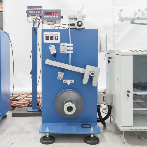 Longitudinal cable taping units